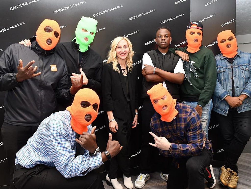 Music star REMA welcomed by US fans seen spotting his usual ski mask ...